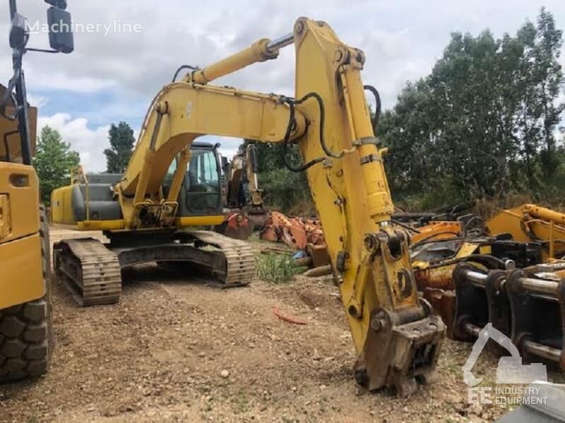 New Holland E 385 bager guseničar