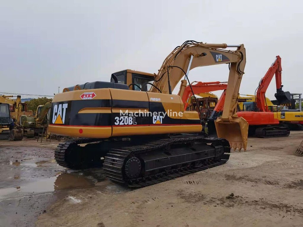 Caterpillar 320BL bager guseničar