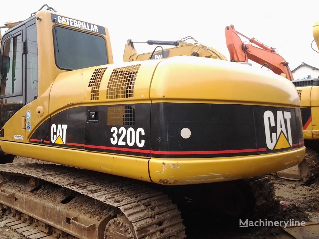 Caterpillar 320C 320CL bager guseničar