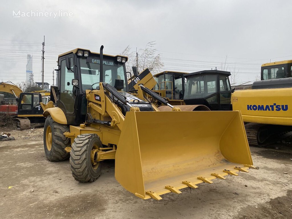 Caterpillar 420E bager-utovarivač