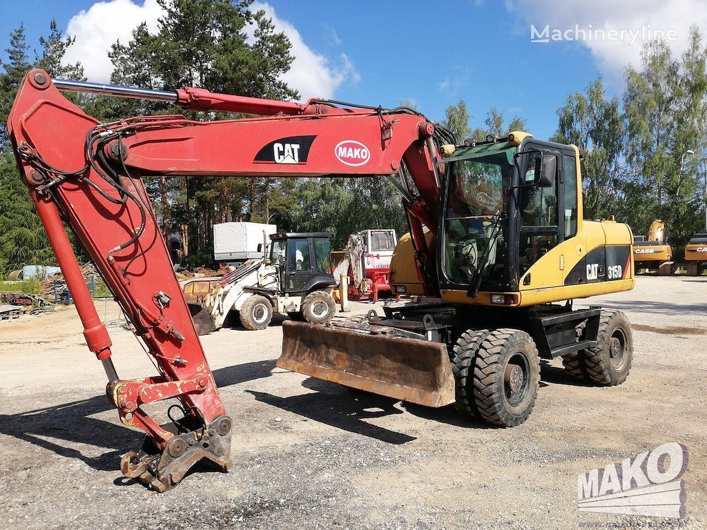 Caterpillar M315C bager točkaš