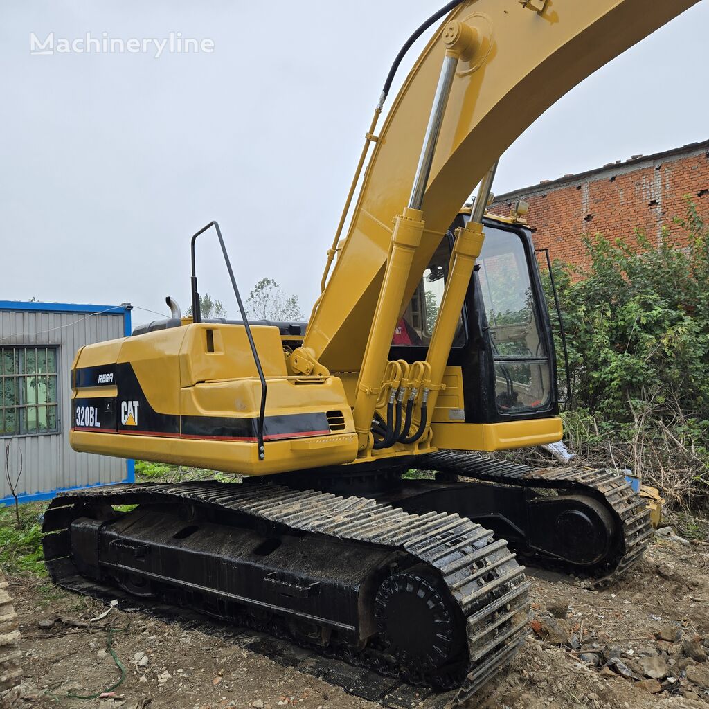 Caterpillar 320BL bager guseničar