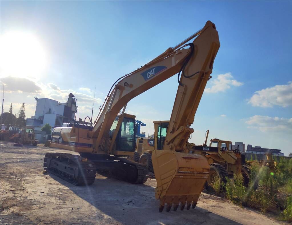 Caterpillar 325 BL bager guseničar