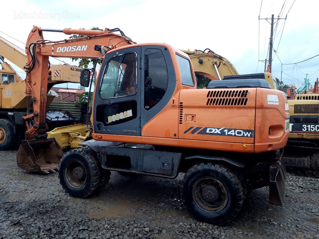 Doosan DX140W bager točkaš