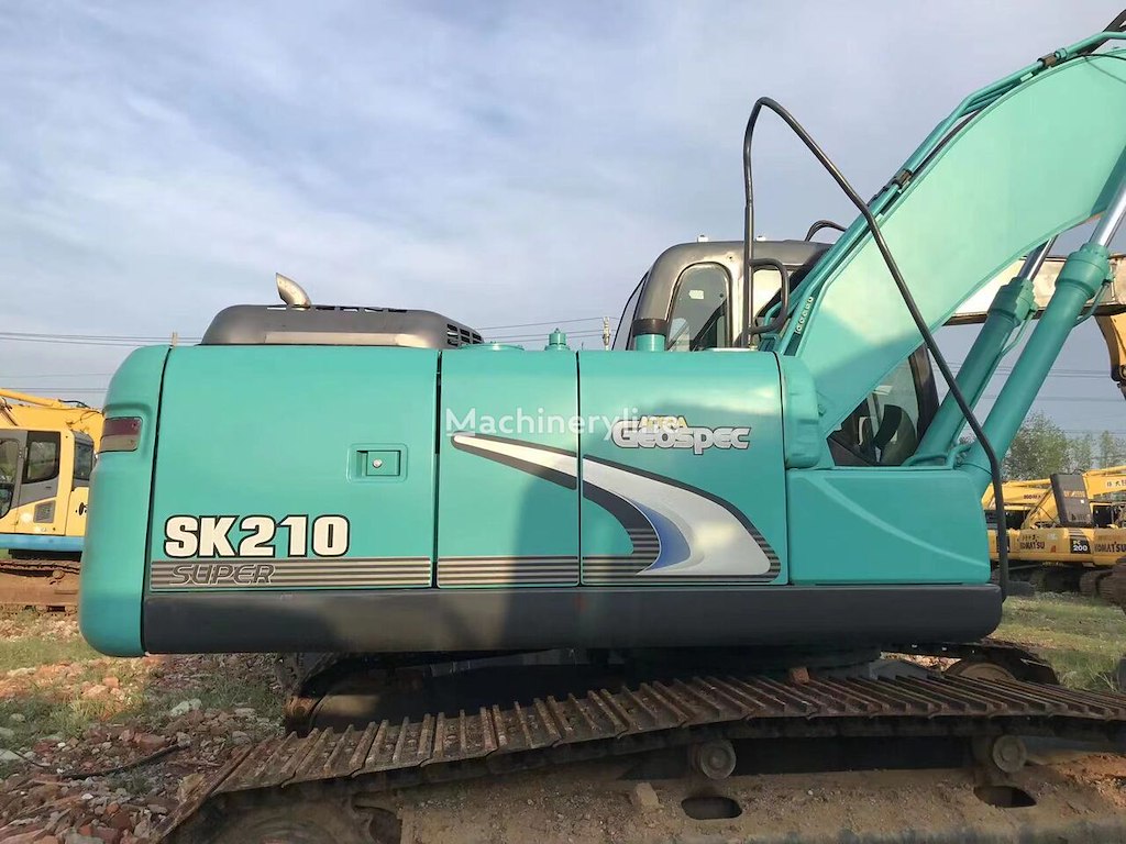 Kobelco SK210 bager guseničar