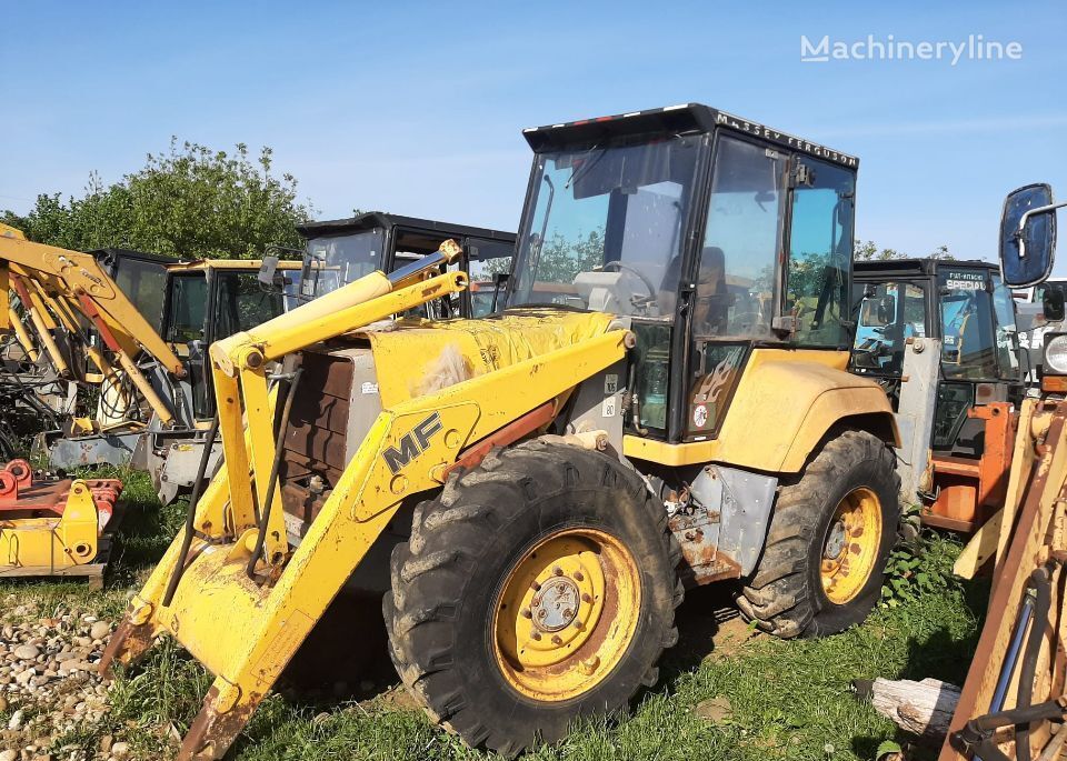 Massey Ferguson 965 bager-utovarivač