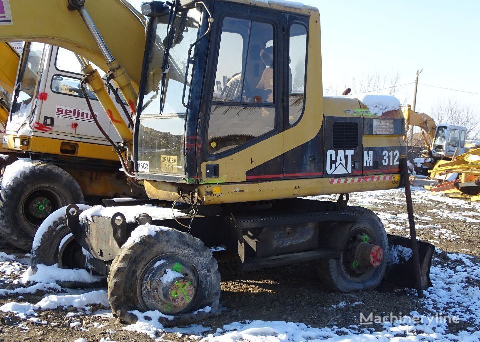 Caterpillar 312 M,piese bager točkaš po rezervnim delovima