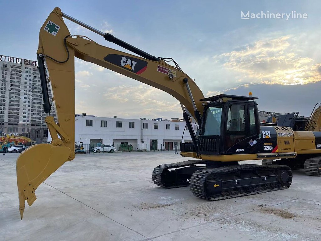 Caterpillar 320DL bager guseničar