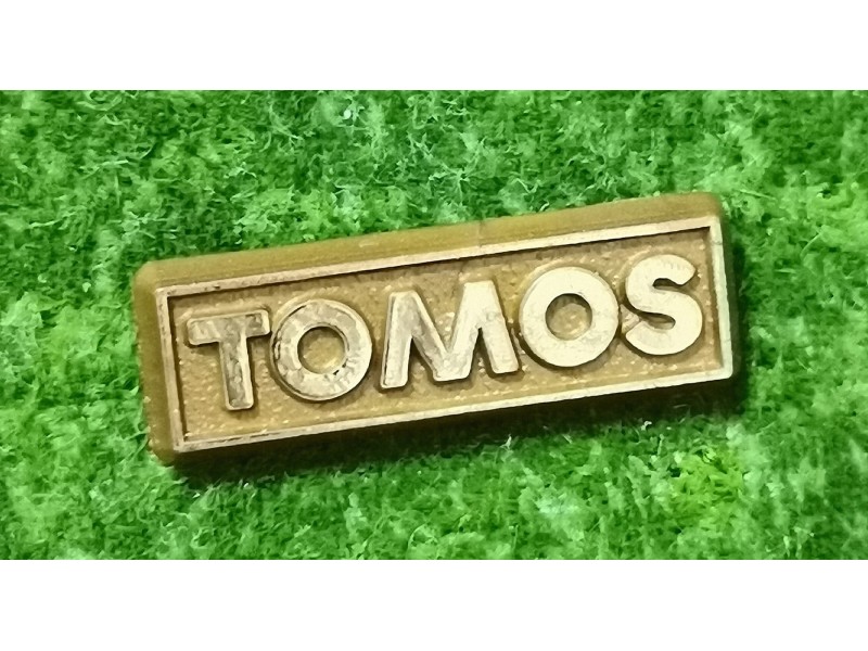 TOMOS.