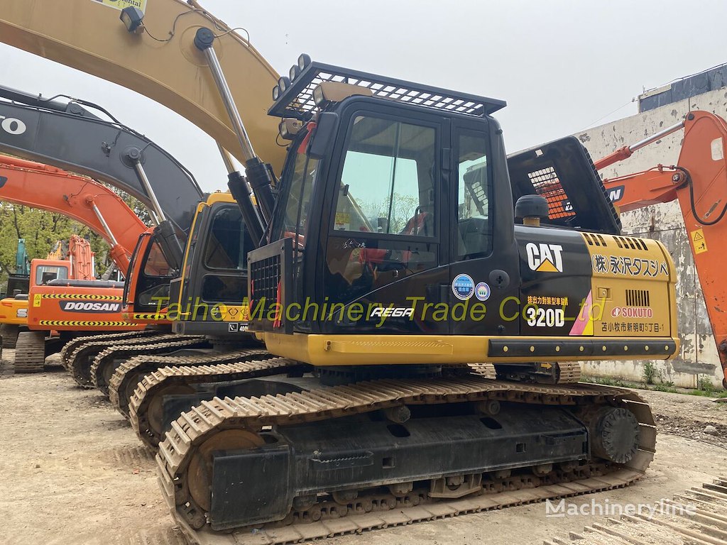 Caterpillar 320DL bager guseničar