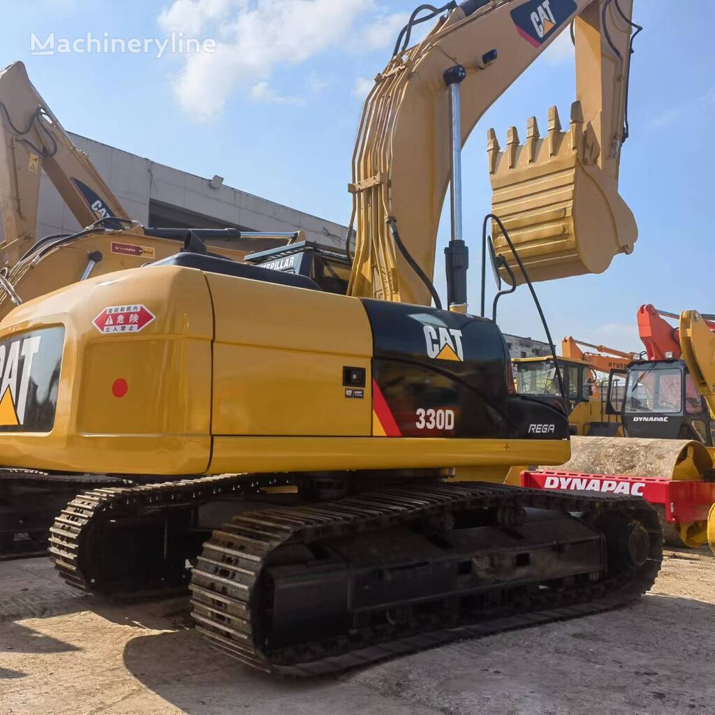 Caterpillar 330DL bager guseničar