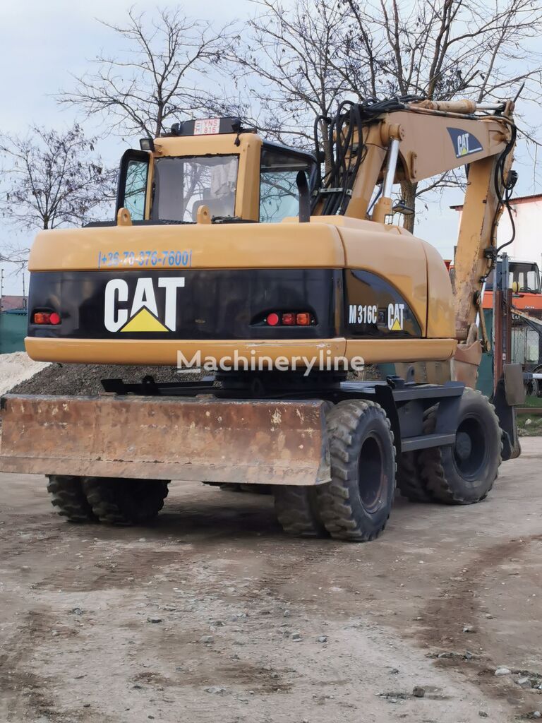 Caterpillar M316 C bager točkaš