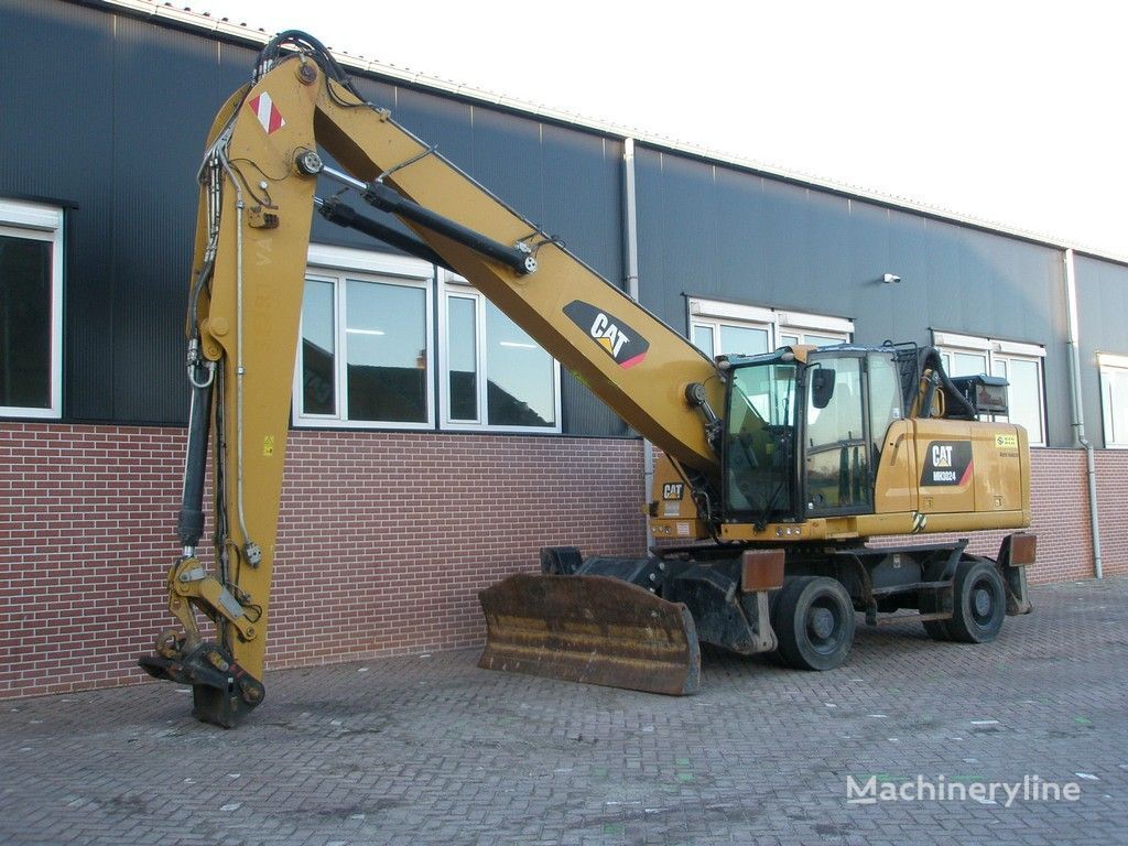 Caterpillar MH3024 bager za pretovar