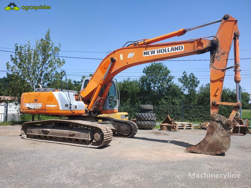 New Holland E265 bager guseničar