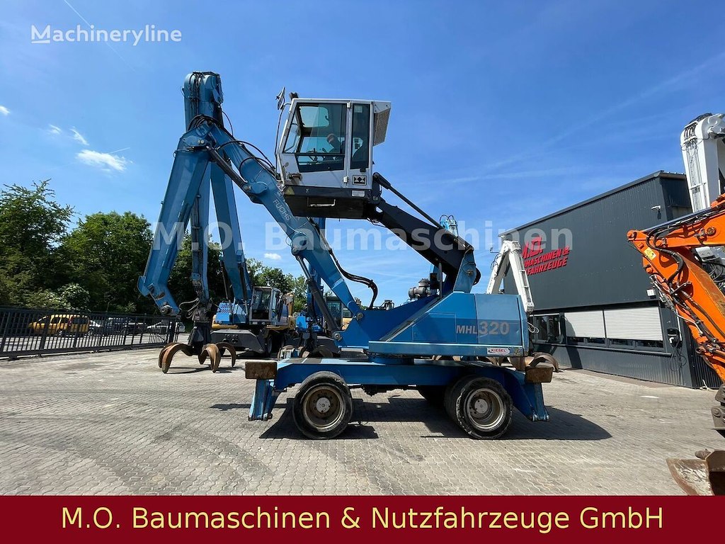 Fuchs MHL 320/ZSA/Hochfahrbare Kabine/Magnetanlage bager za pretovar