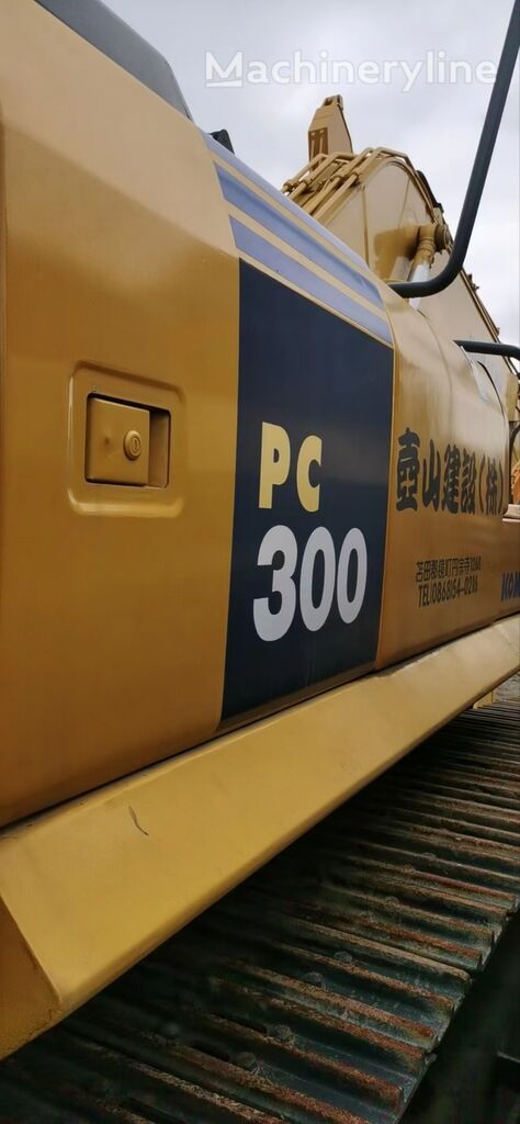 Komatsu PC300 bager guseničar