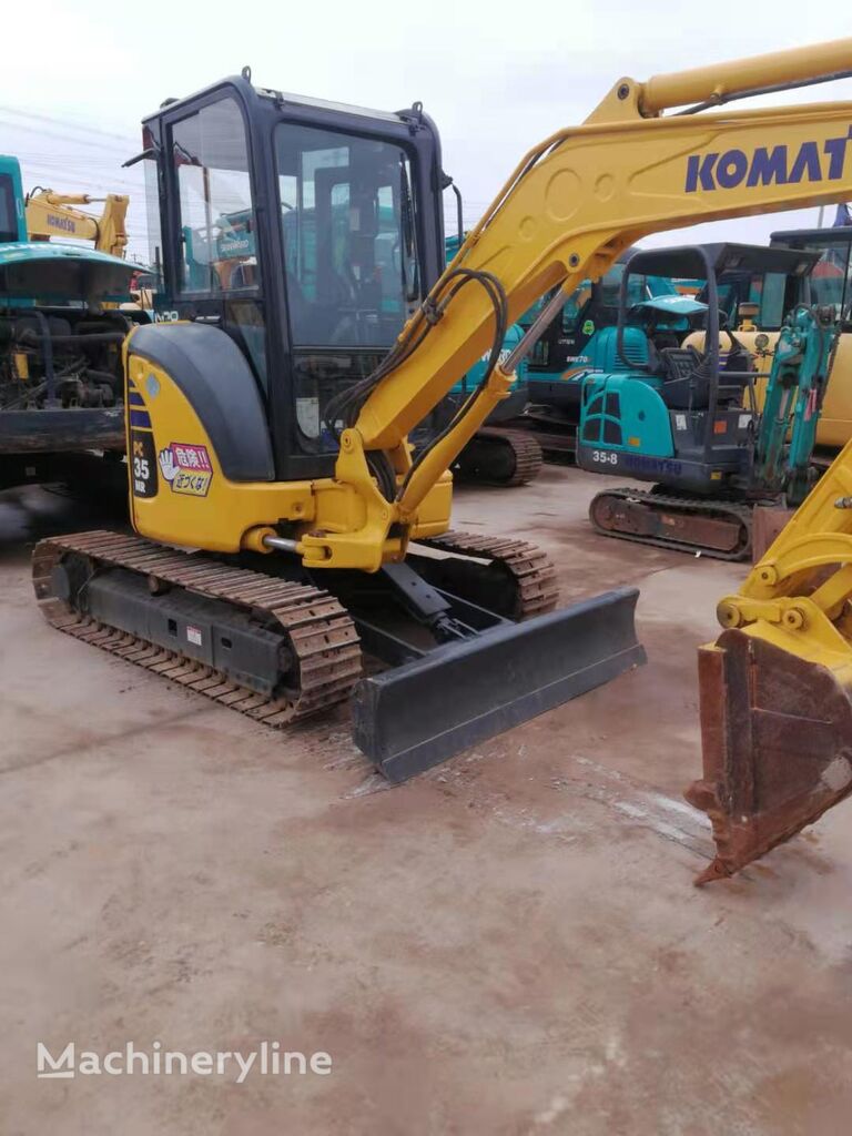 Komatsu PC35 bager guseničar