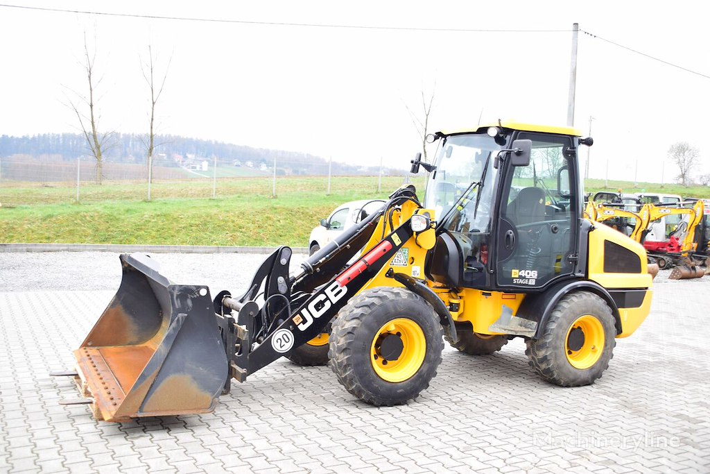 JCB 406 Toolmaster prednji utovarivač