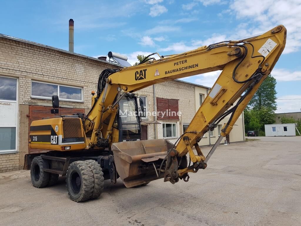 Caterpillar M315 bager točkaš