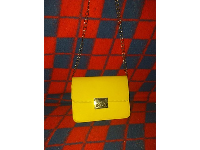 Ženska kožna torbica žute boje