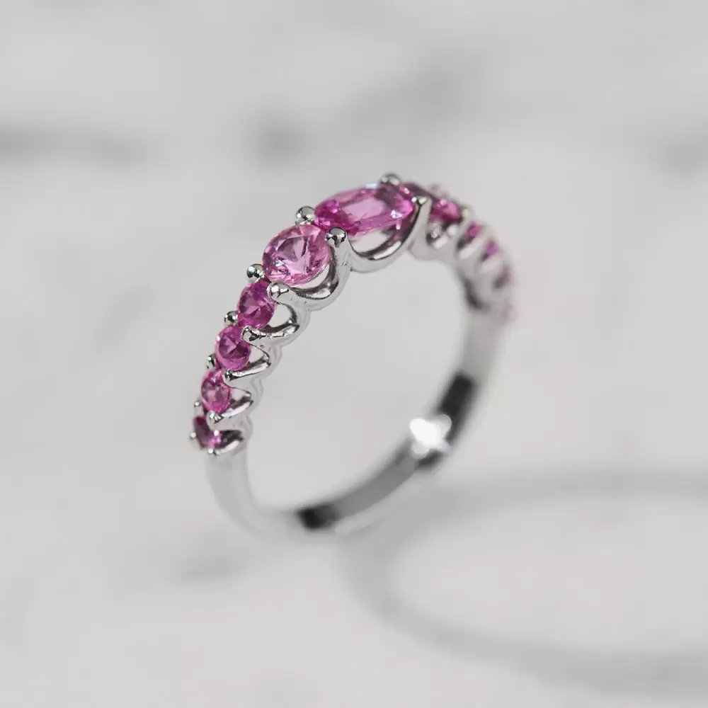 Prsten sa pink safirima, 242