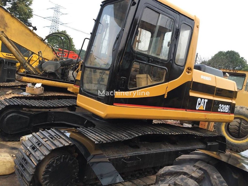 Caterpillar 320BL bager guseničar