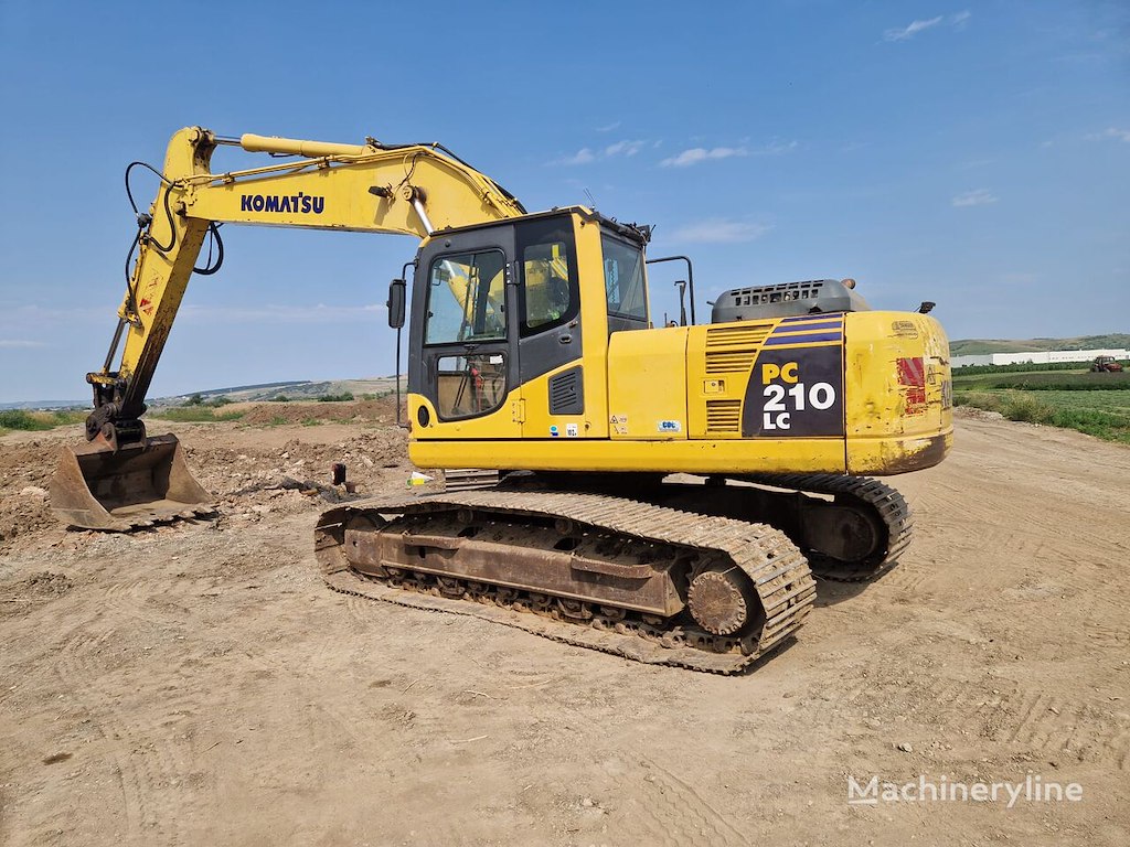 Komatsu PC210 bager guseničar