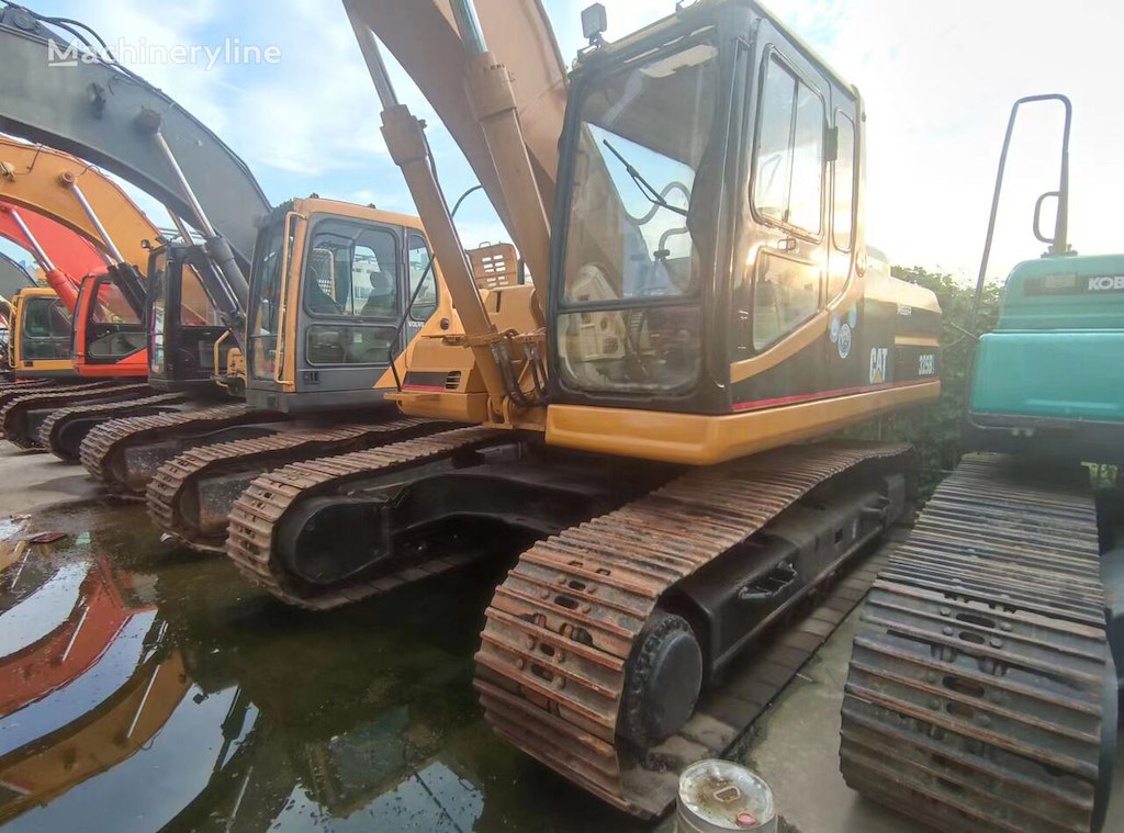 Caterpillar 325BL bager guseničar