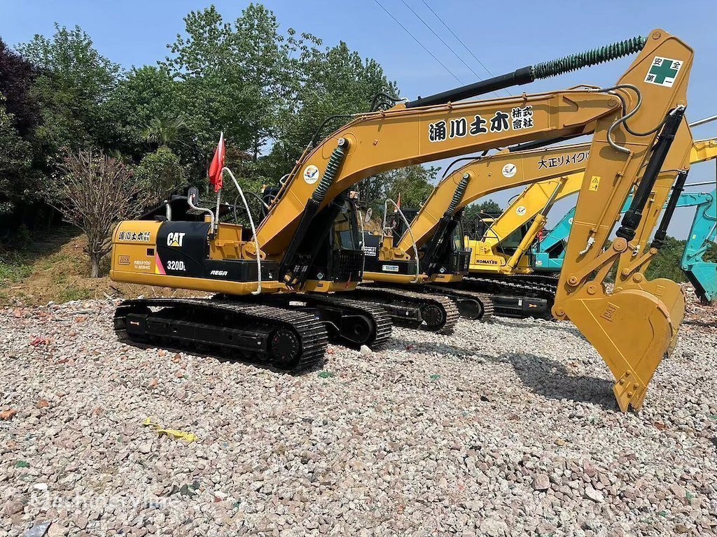 Caterpillar 320DL bager guseničar