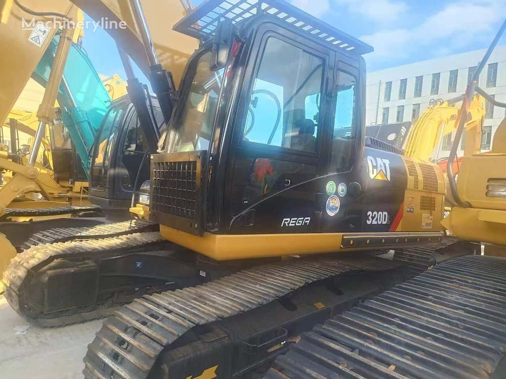 Caterpillar 320DL bager guseničar