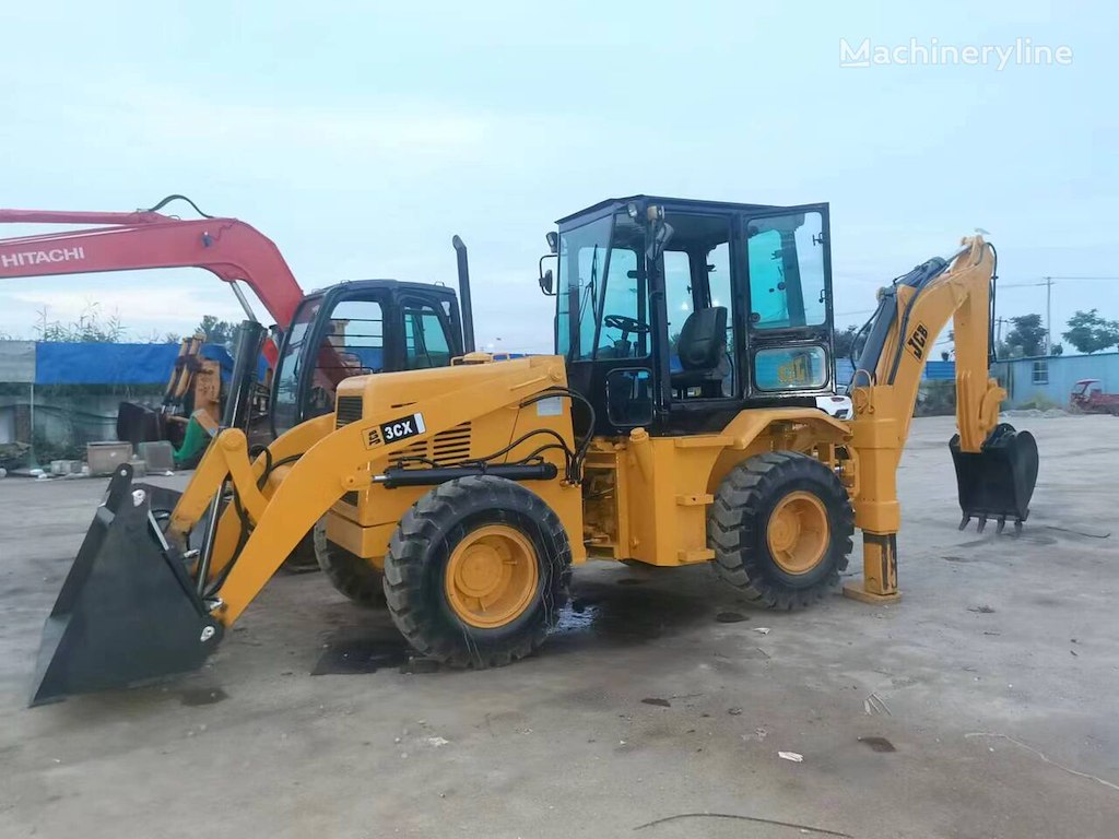 JCB 3CX with four-way shovel bager-utovarivač