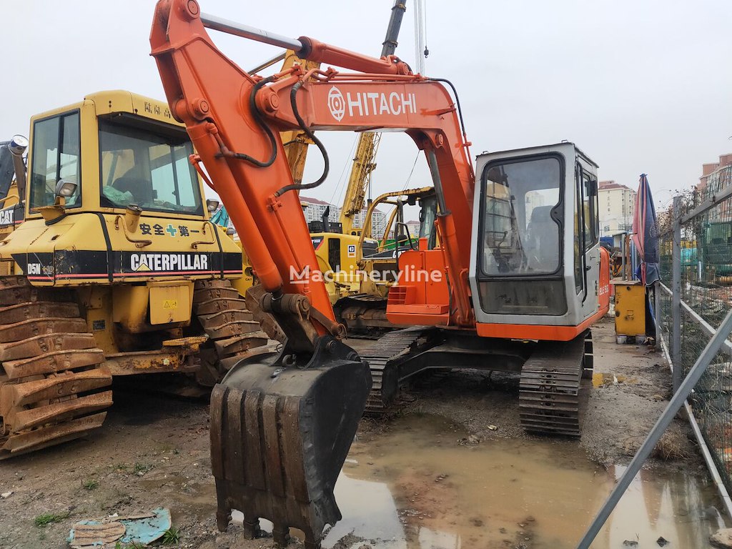 Hitachi EX60 bager guseničar