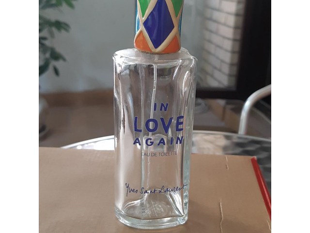 Prazna bočica od parfema Yves Saint Laurent