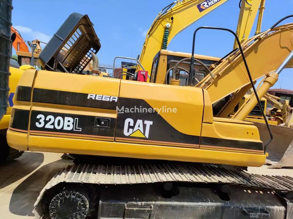 Caterpillar 320b 320bl bager guseničar