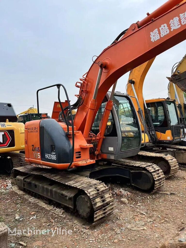 Hitachi ZX135 bager guseničar