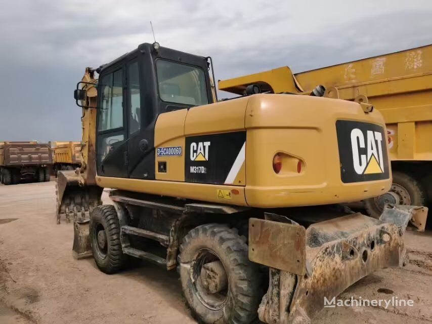 Caterpillar M317D2 bager točkaš