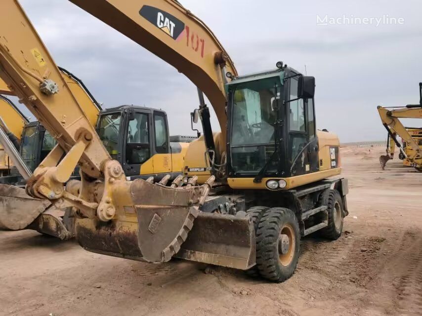 Caterpillar M320D2 bager točkaš