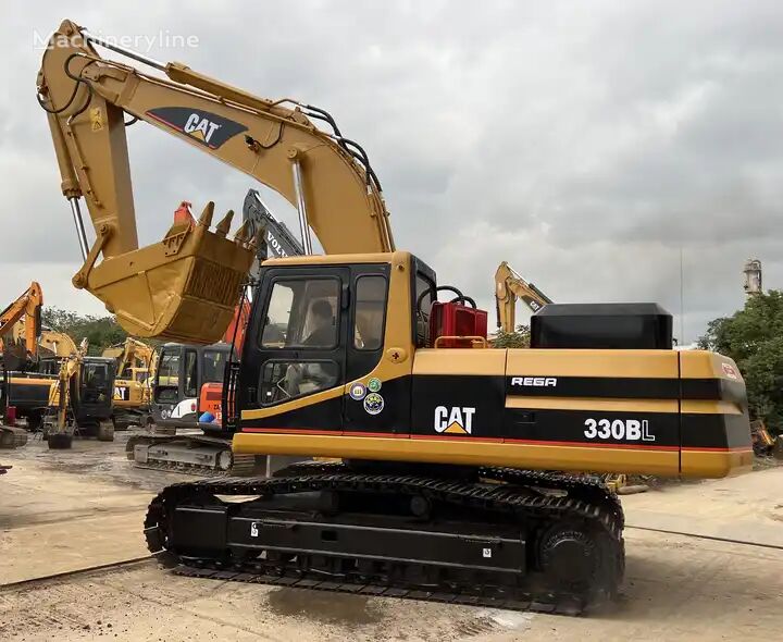 Caterpillar 330BL bager guseničar