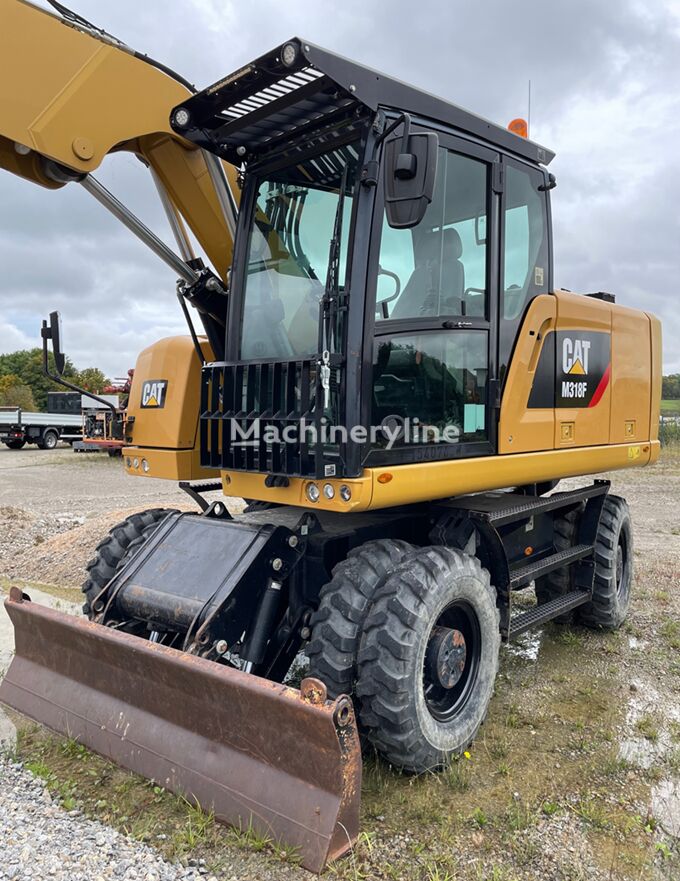 Caterpillar M318F bager točkaš