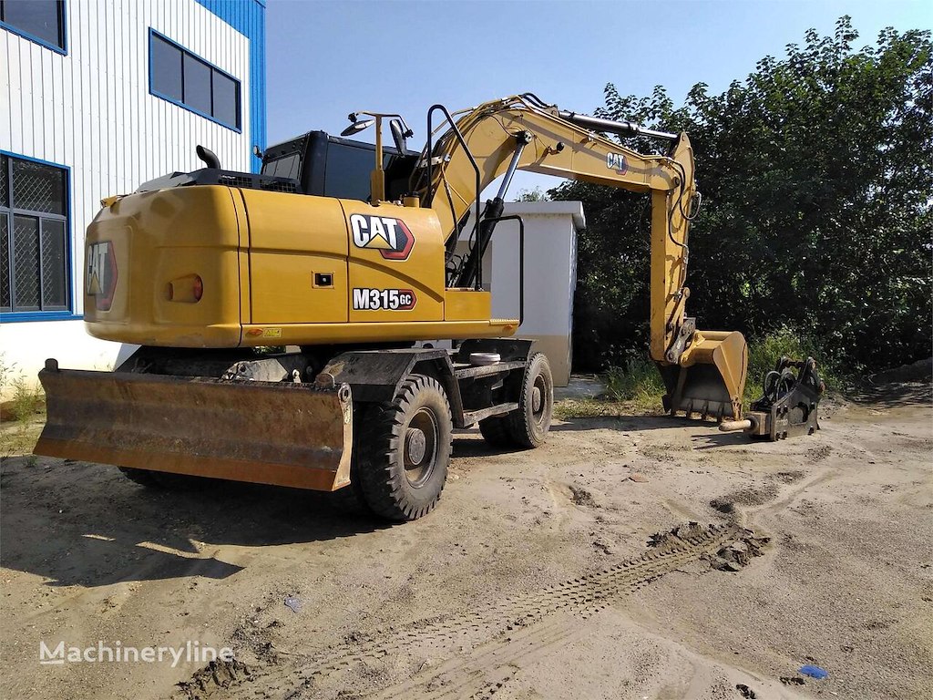 Caterpillar M315GC bager točkaš