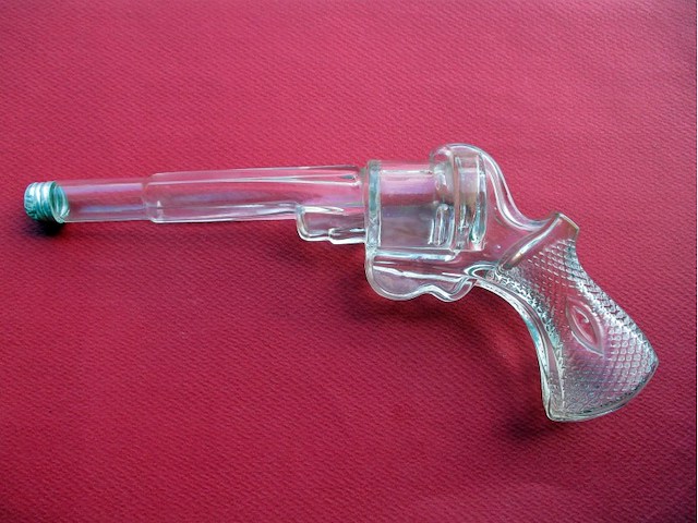 staklena flaša u obliku revolvera