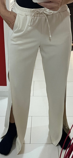 Zara bele pantalone sa prorezima