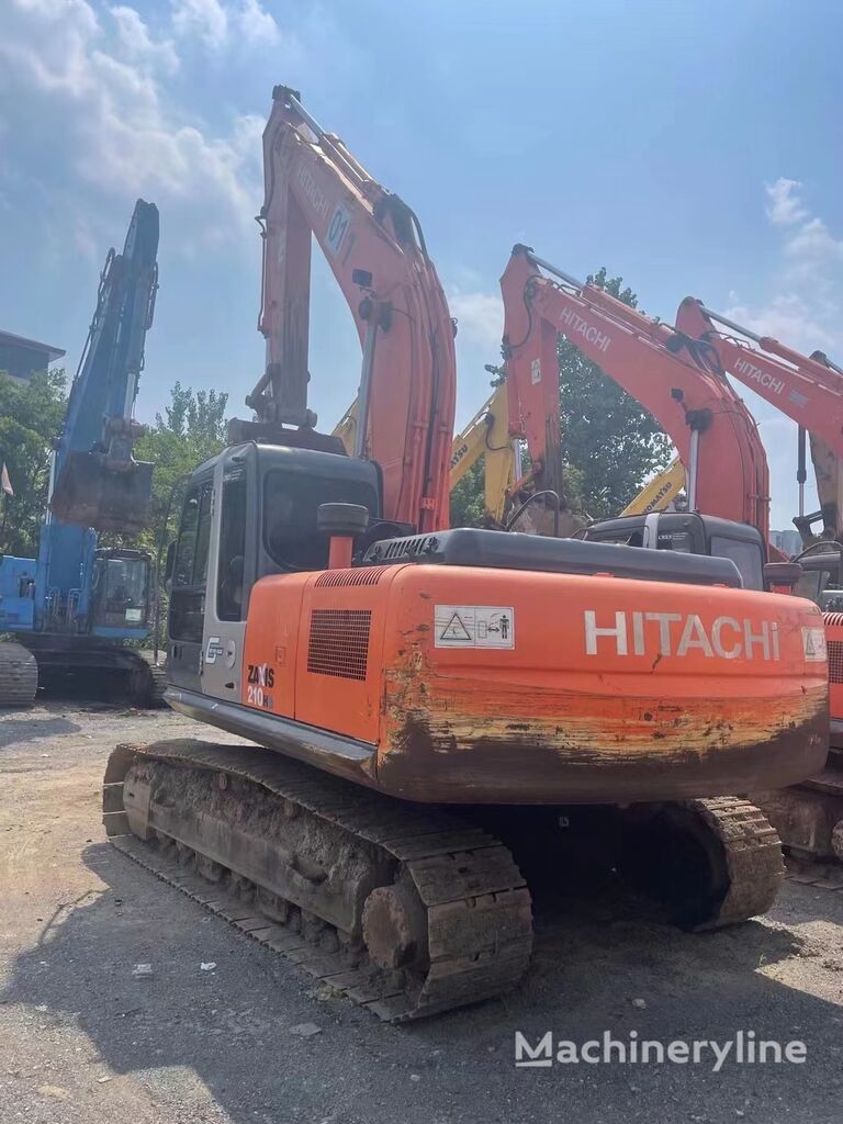 Hitachi ZX210 bager guseničar