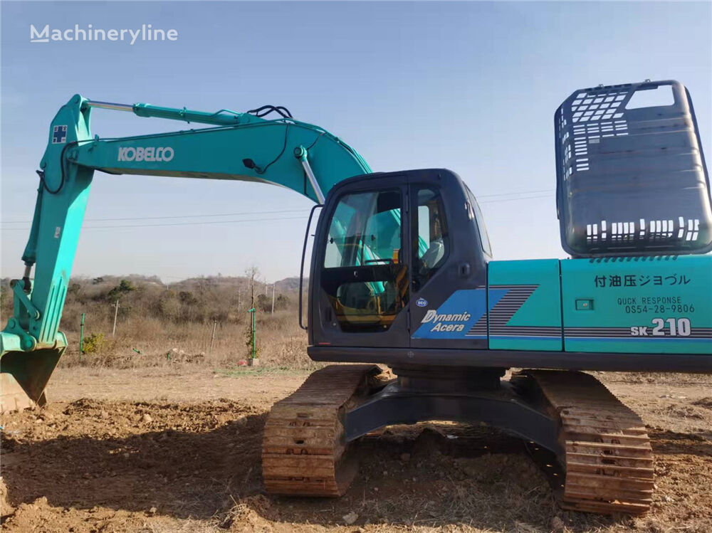 Kobelco SK210 bager guseničar