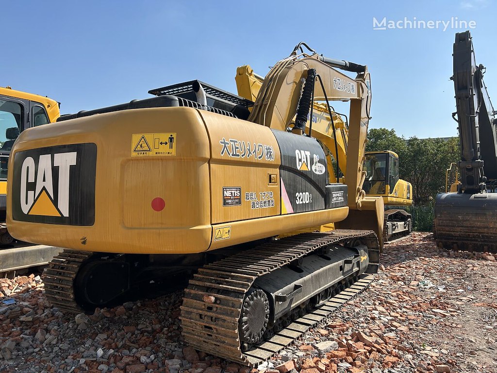 Caterpillar 320DL bager guseničar