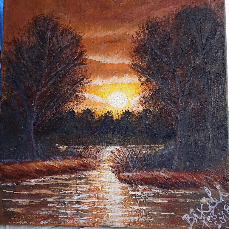 Zalazak sunca na reci