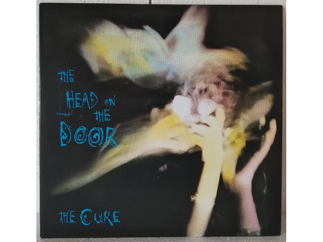 LPS Cure - The Head On The Door (EU)