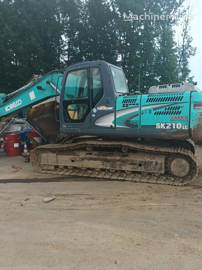 Kobelco SK210 bager guseničar