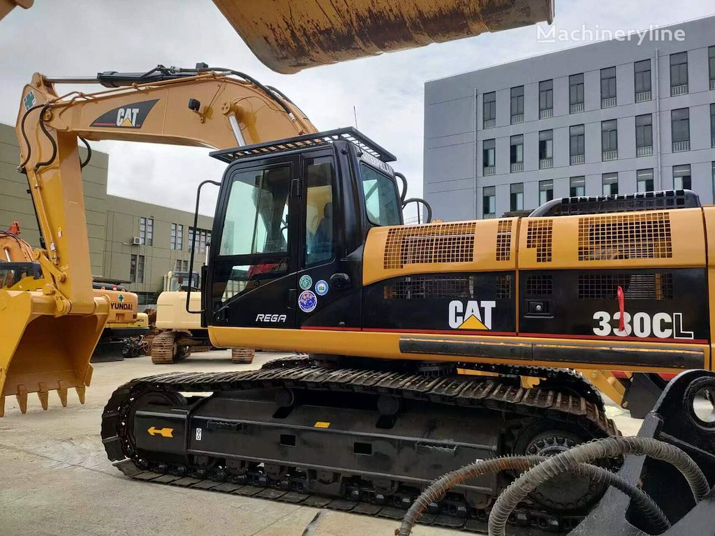 Caterpillar 320CL bager guseničar