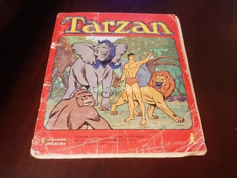 Tarzan album Decje novine delimicno popunjen fali tridesetak polovan album za popunjavanje boljih